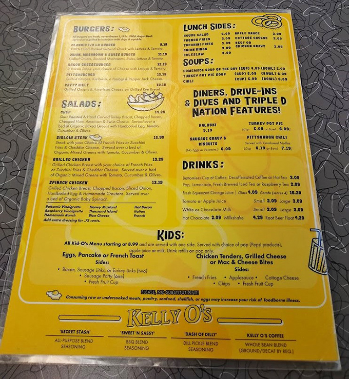 The golden-hued menu reads like a love letter to American classics. Breakfast all day? That's not a luxury—that's a necessity!