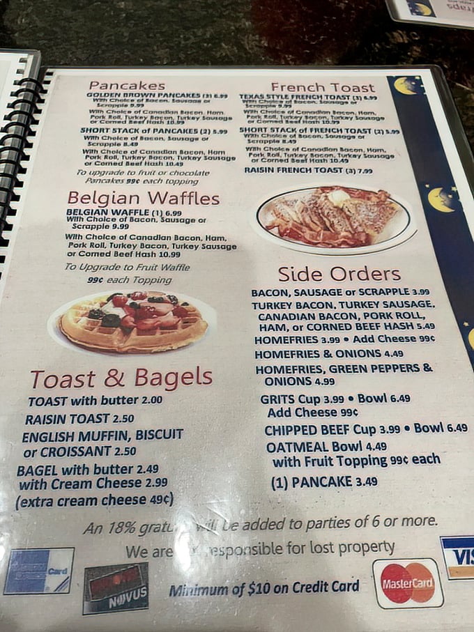 This menu isn't just a list of food – it's a roadmap to happiness. The Belgian waffle section alone could solve world peace.