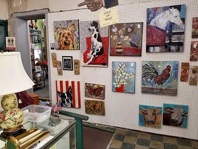 This wall of animal art proves that before Instagram pet accounts, people still found ways to immortalize their furry friends—just with more paint and fewer filters.