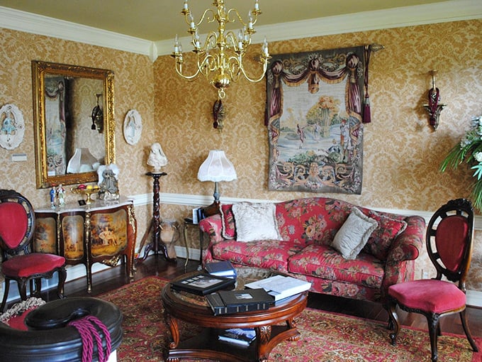This parlor doesn't just whisper elegance—it practically recites poetry. The gold-framed mirror and tapestry transport you to another era entirely.