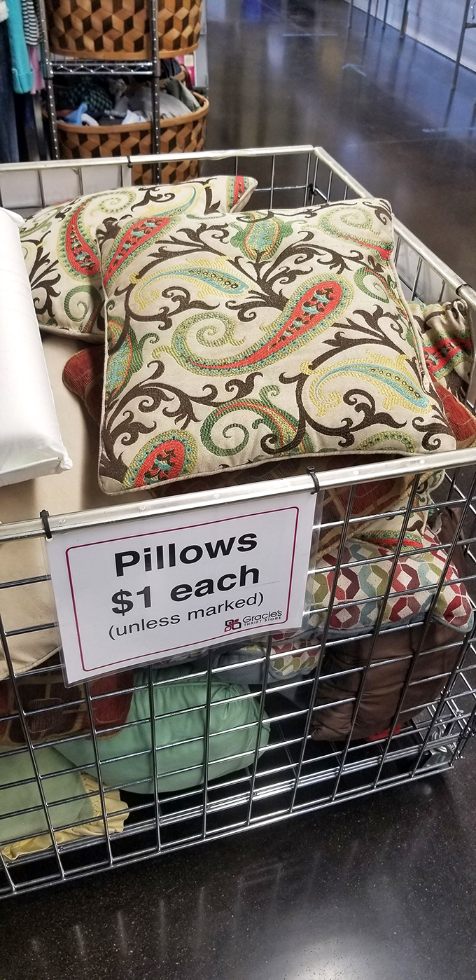Decorative pillows overflow from wire baskets, each one a cozy story waiting for new chapters.