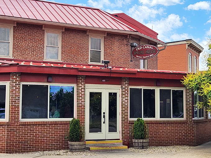 The Old Canal Smoke House isn't just serving barbecue; it's offering edible history in a building that's seen more stories than your favorite librarian.