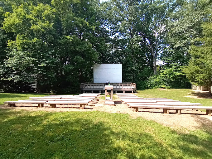 Outdoor theater under the canopy of trees – where the only special effects are provided by Mother Nature herself.
