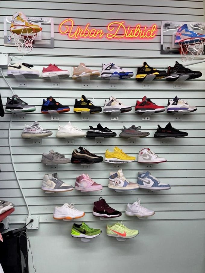 The Urban District sneaker display isn't just footwear—it's a museum of athletic fashion history where basketball dreams are sold by the pair.