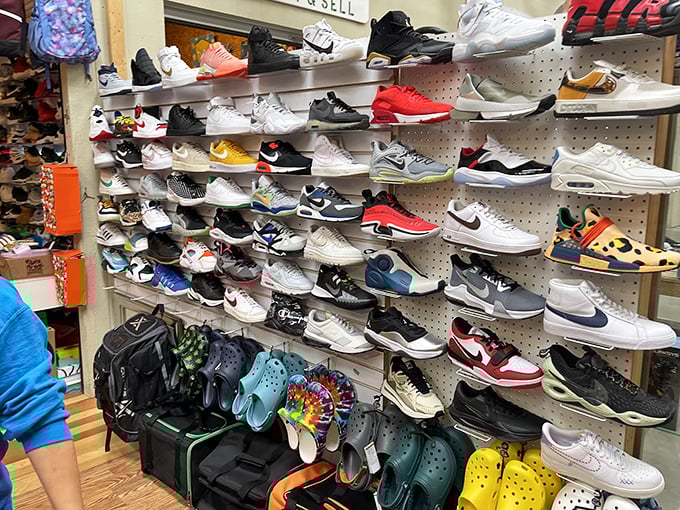 Sneakerheads, rejoice! This wall of footwear would make even Imelda Marcos pause in admiration—every style, every color, every decade represented.