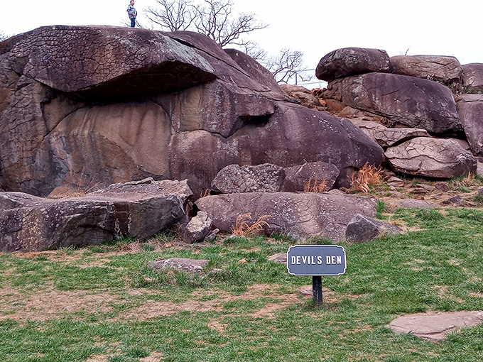 The sign doesn't lie—this is indeed the devil of a place where Union and Confederate forces clashed in 1863, turning ancient rocks into strategic battlements.