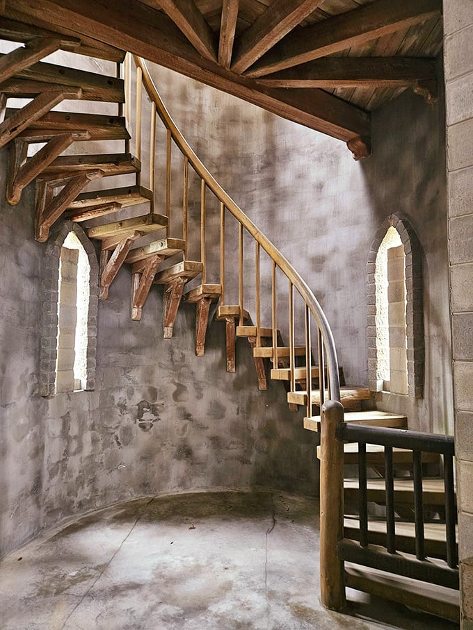 These spiral stairs wind upward like a scene from your favorite fairy tale, beckoning adventurous souls.