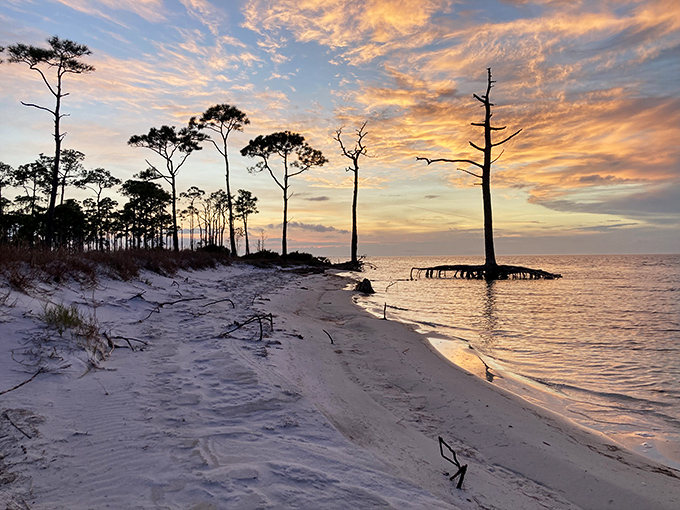 Drama in the sky, serenity on the shore. Nature's perfect contradiction unfolds here daily.