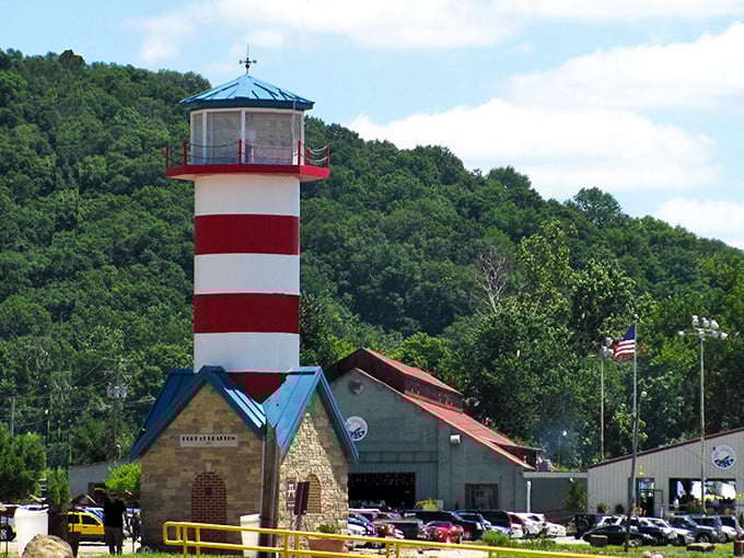 A lighthouse stands proud against lush green hills in Elsah, like a maritime guardian that took a wrong turn and fell in love with Illinois.
