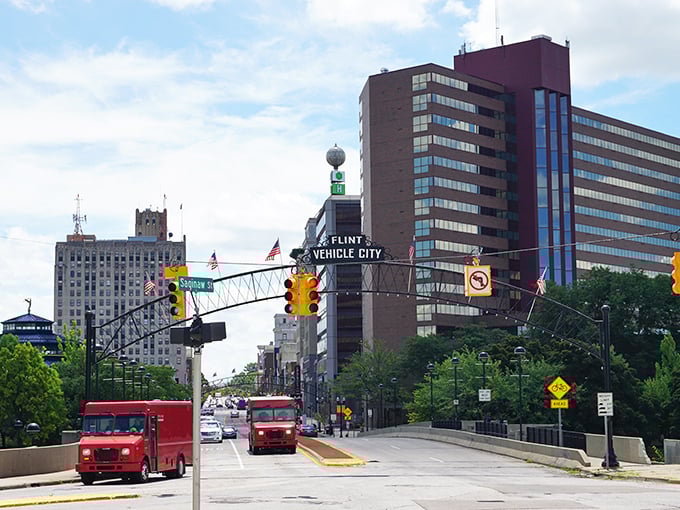 Flint's iconic "Vehicle City" arch spans across downtown, a proud reminder of the city's automotive heritage.