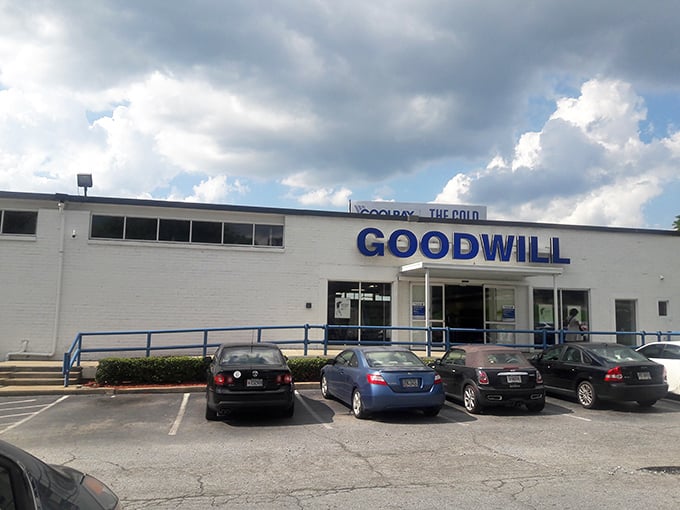 Goodwill's classic white building with blue trim stands ready to welcome shoppers seeking both bargains and purpose.
