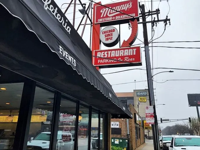 Manny's vintage neon sign glows like a Chicago lighthouse guiding hungry souls home.