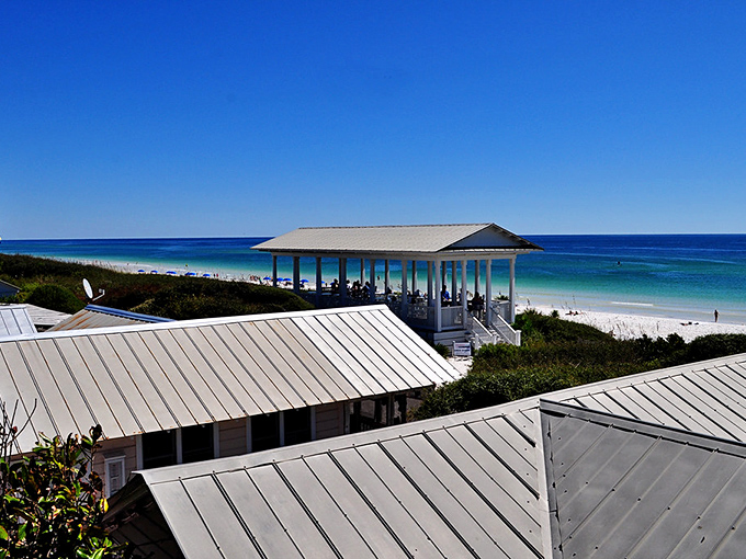 With rooftops glinting in the sun and ocean blues stretching for miles, Seaside doesn’t just play the part — it is the postcard.