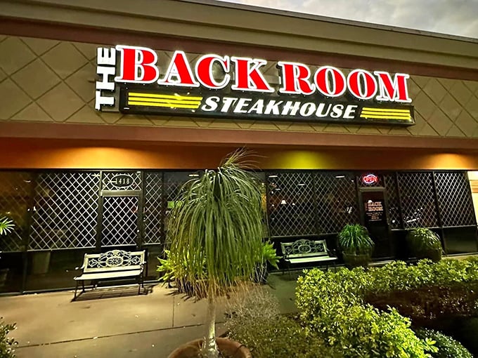 The Back Room's bold red sign promises what every carnivore dreams of – a sanctuary dedicated to perfect steaks.