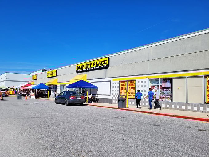 Washington Boulevard Marketplace: where the yellow sign beckons like a beacon to bargain-loving moths.