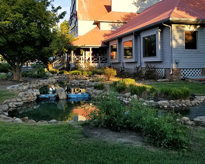 The peaceful pond outside Cock of the Walk sets the perfect scene for what's about to happen inside—a catfish transformation that borders on magic.