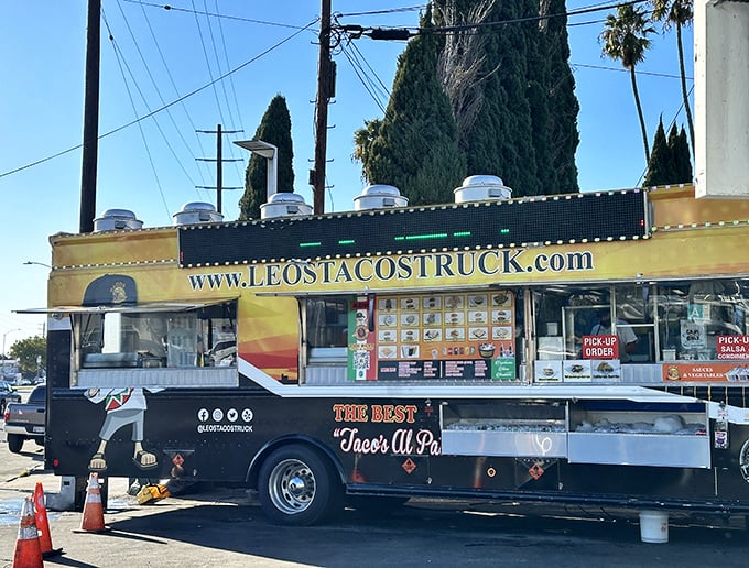 The website address says it all—this is taco royalty on wheels. Leo's black and gold truck serves up al pastor sliced straight from heaven.