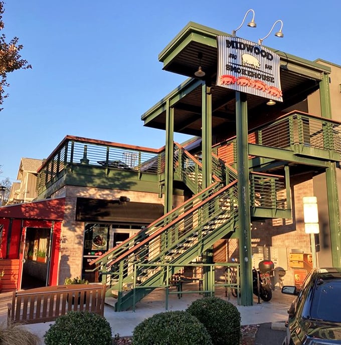 Sunset casts a golden glow on Midwood's multi-level charm – much like their chicken's perfect crust catches the light before that first heavenly bite.