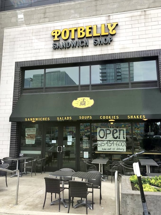 That yellow awning signals sandwich salvation—where toasted bread meets fresh ingredients in a harmony sweeter than any Nashville tune.