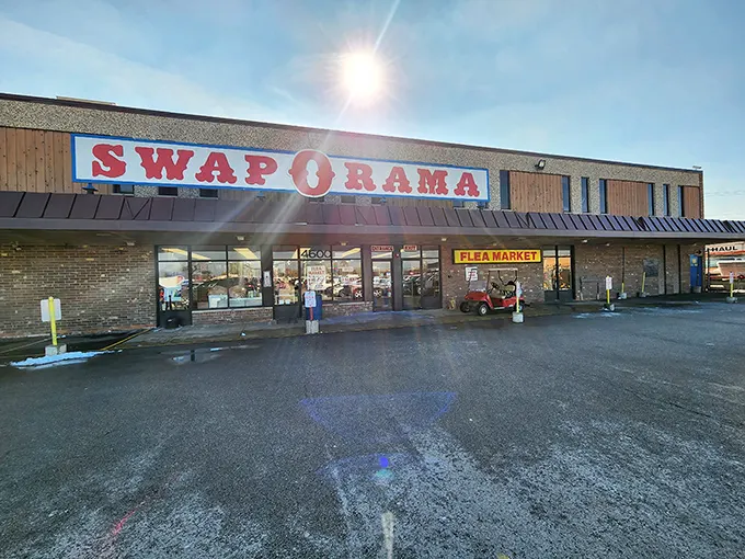 Dawn patrol for deal hunters! Early morning light catches Swap-O-Rama's iconic sign as shoppers prepare for treasure hunting.