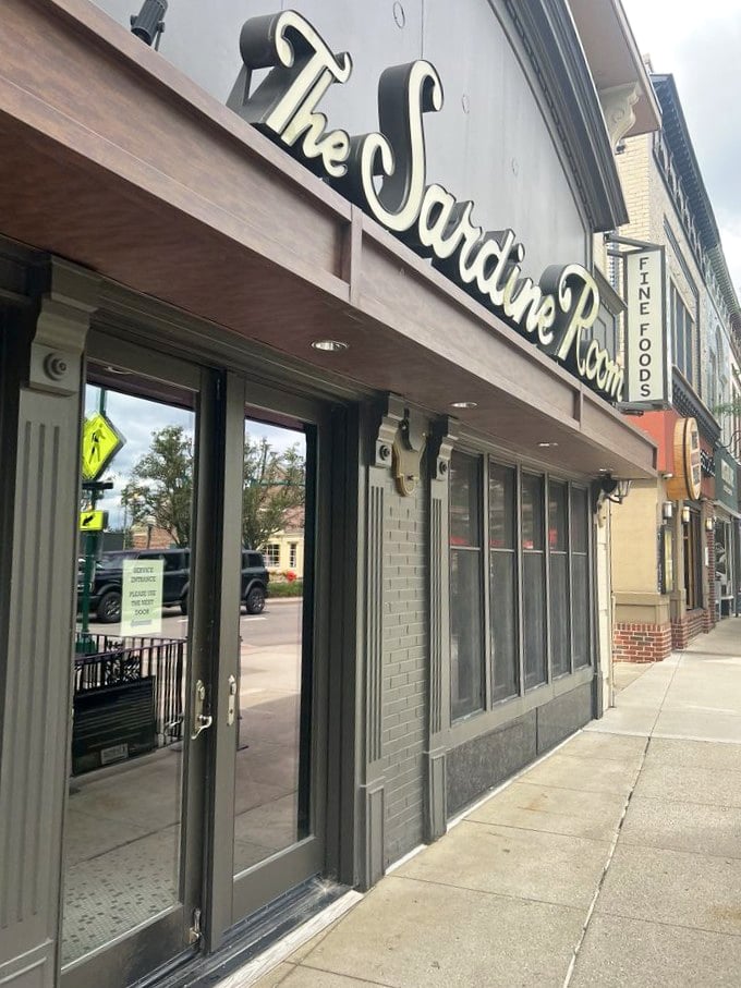 Fine dining without the fuss – The Sardine Room's storefront promises seafood sophistication on Main Street.