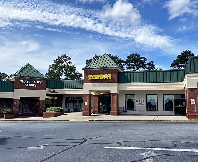 Not all heroes wear capes; some wear green awnings. Zorba's stands ready to rescue you from boring pizza with its Greek-Italian flavor fusion.