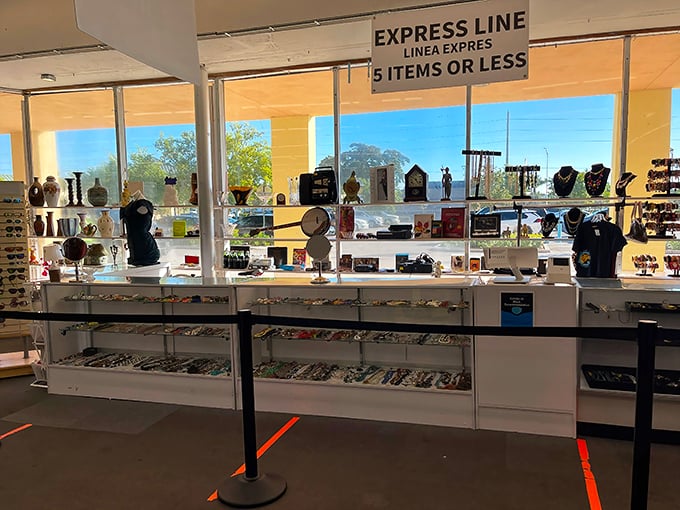 The express checkout counter—where "five items or less" becomes the ultimate test of willpower for bargain hunters with overflowing carts.