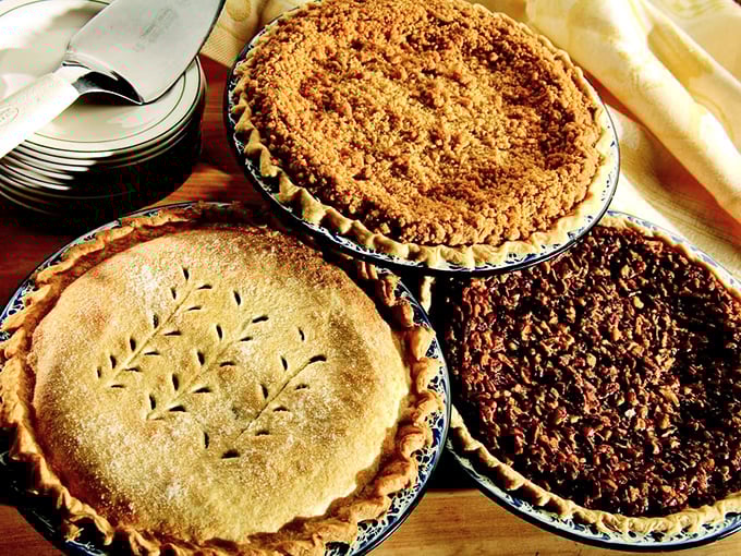 Pie trifecta! These aren't just desserts; they're edible family heirlooms with crusts crimped by hands that understand butter isn't just an ingredient—it's a philosophy.