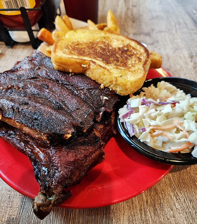 These ribs don't just fall off the bone—they practically leap into your mouth, their bark as perfect as their bite.