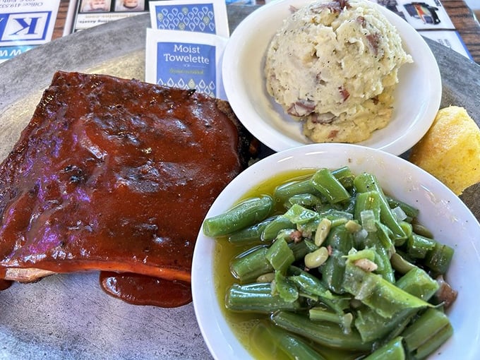 These ribs don't just fall off the bone—they practically leap onto your fork, bringing along perfectly seasoned green beans for the ride.