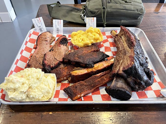 Behold the holy grail of barbecue platters – brisket, ribs, and sides that define what perfection tastes like.