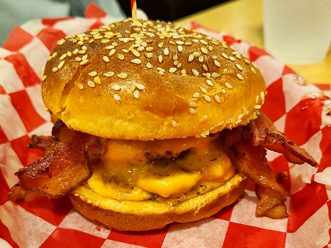 Bacon doesn't ask why—it sizzles and delivers. This burger masterpiece combines melty cheese, crispy bacon, and a perfect patty in a dance of flavor that deserves a standing ovation.