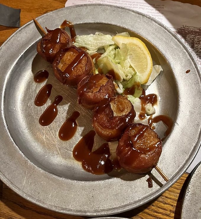 Bacon-wrapped scallops that would make Benjamin Franklin postpone electricity for another day—glistening with sweet glaze and served with a side of historical significance.