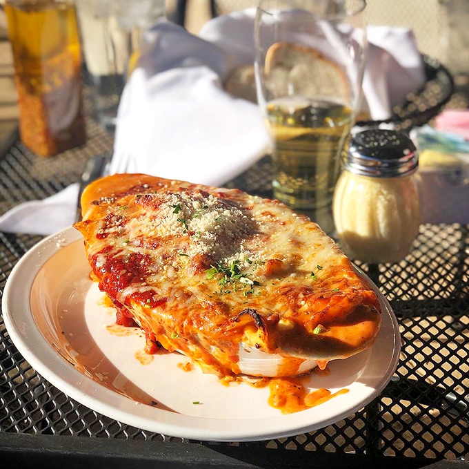 Lasagna that doesn't just sit on the plate—it poses triumphantly. Those layers of pasta, sauce, and cheese are practically winking at you.