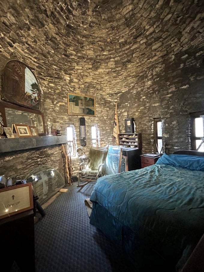 The castle's bedroom features a circular stone wall that would make any medieval monarch feel right at home, though with considerably better bedding. 