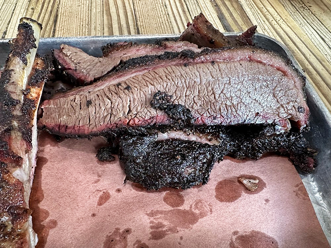 Behold the holy grail of Texas barbecue – brisket so tender it practically surrenders before you take a bite.