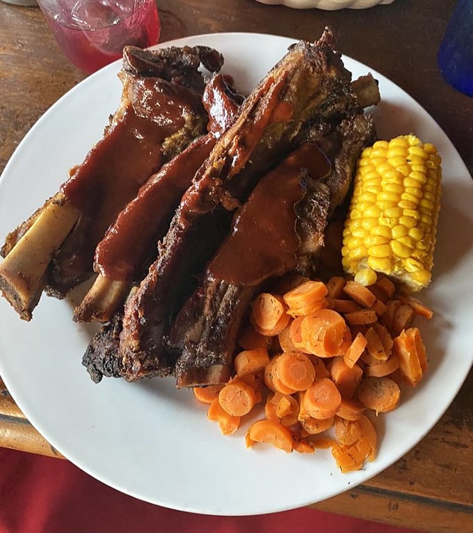 These beef ribs aren't just dinner—they're prehistoric monuments to carnivorous joy. Fred Flintstone would tip his car over for a rack this magnificent.