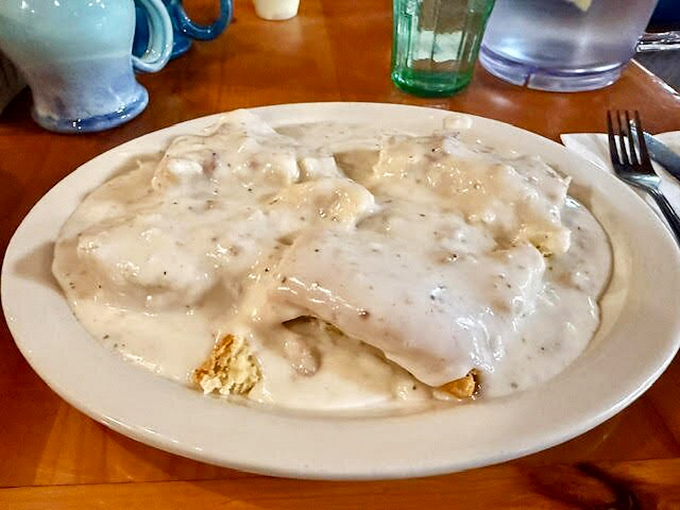 Biscuits and gravy that could make a grown person weep with joy. This isn't breakfast – it's an edible hug on a plate.