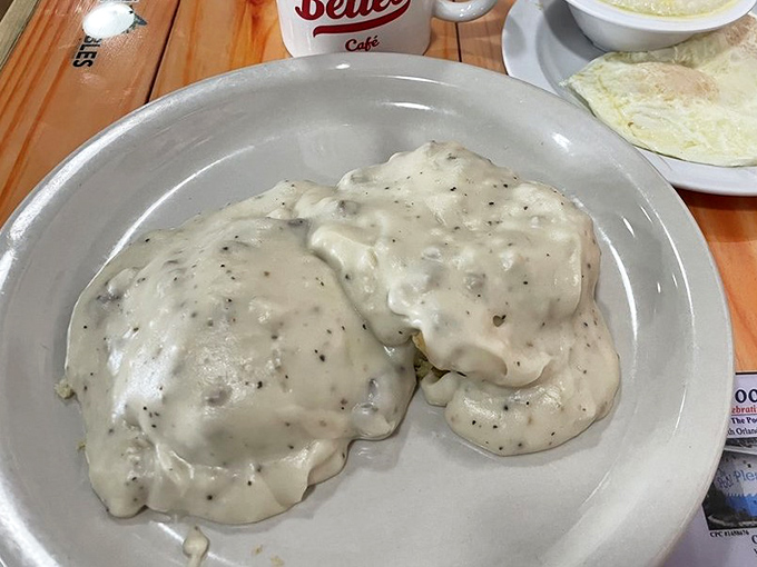 Behold the star attraction: biscuits drowning in pepper-flecked sausage gravy. Not winning any beauty contests, but definitely capturing hearts and stomachs across Orlando.