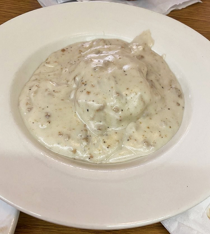 These biscuits and gravy aren't just breakfast, they're an Ohio institution—creamy, peppery perfection that makes you wonder why you'd ever skip the most important meal.