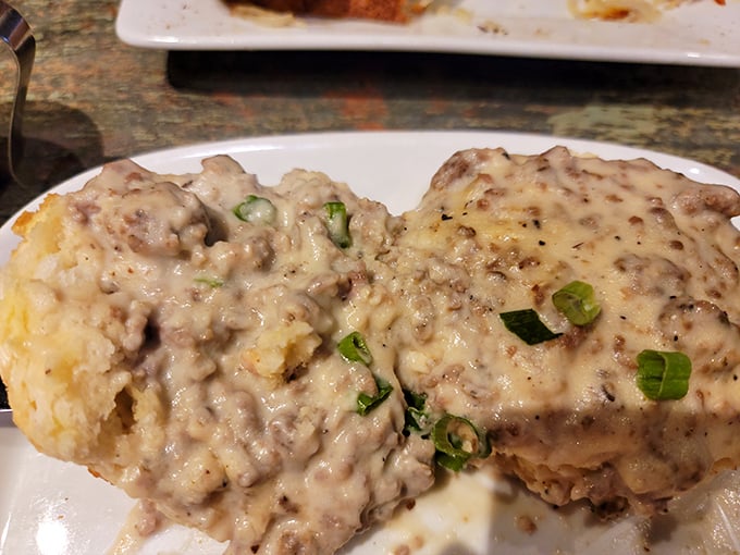 Biscuits and gravy that would make your grandma jealous—a creamy, savory blanket of comfort food that's worth every delicious calorie.