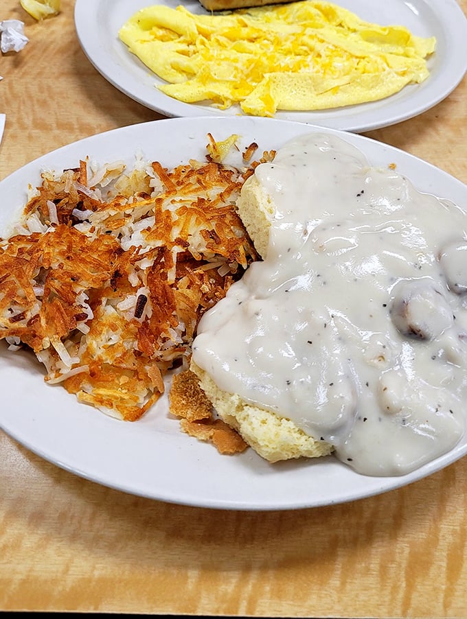 These biscuits and gravy aren't messing around—golden hashbrowns with that perfect crisp edge and gravy so good you'll want to write home about it.