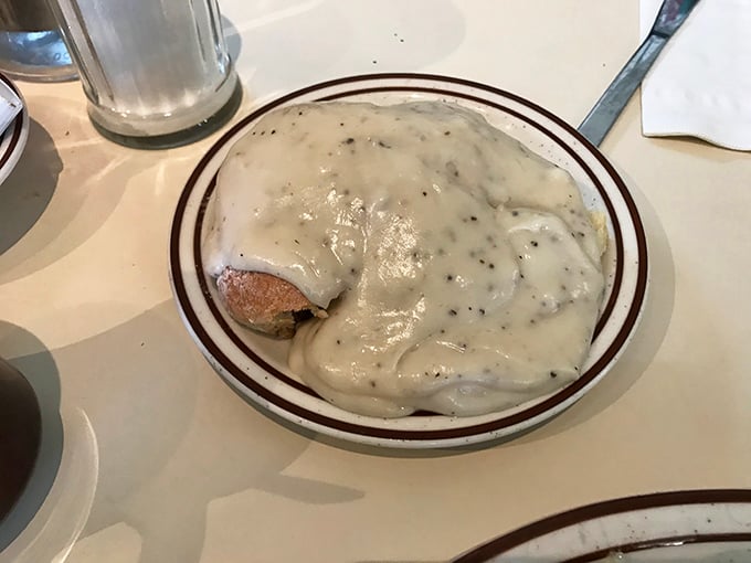 Behold the holy grail of comfort food: biscuits and gravy so decadent, you'll want to write home about it—if you can lift your fork.