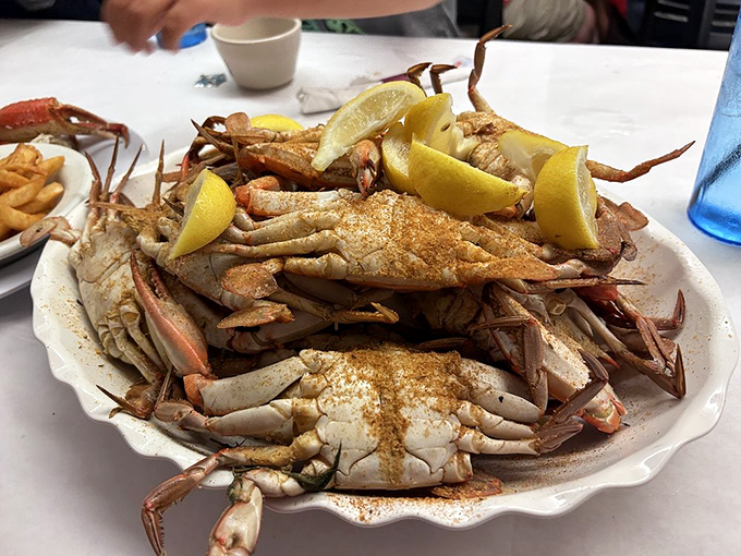 Blue crab heaven on a plate. These seasoned beauties aren't just food—they're an interactive dining experience requiring tools, technique, and napkins. Lots of napkins.
