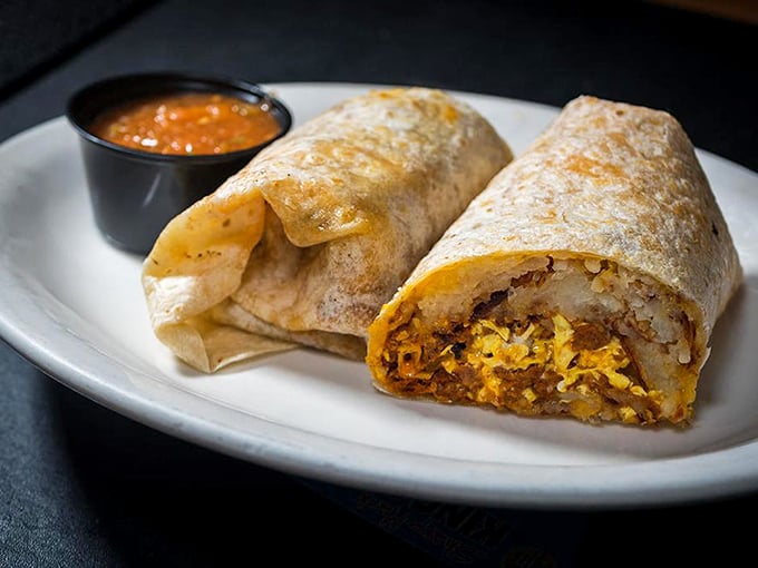 Breakfast burritos so perfectly stuffed they could make a cardiologist nervous but are worth every delicious, cheese-pulling bite.