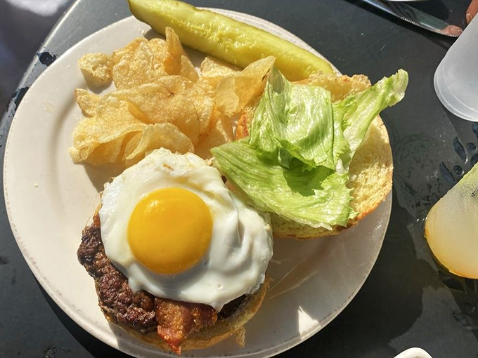 The breakfast burger that answers the eternal question: "Why choose between breakfast and lunch?" That sunny-side up egg is the crown jewel.