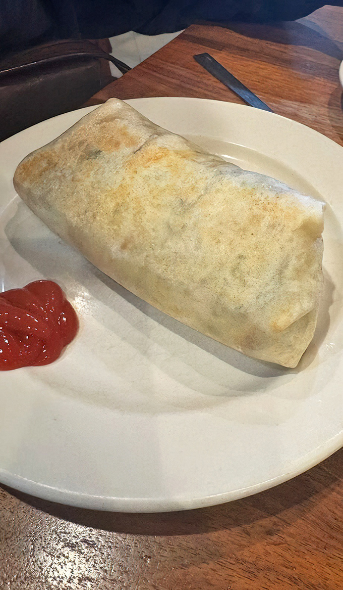 This breakfast burrito isn't just a meal—it's a morning masterpiece wrapped in a tortilla, ready to rescue you from hunger's clutches.