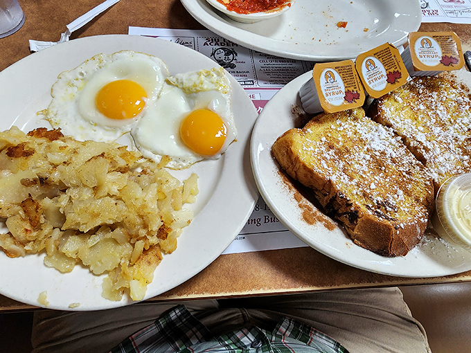 Sunny-side up eggs with perfectly crispy home fries – the breakfast equivalent of winning the lottery without having to share the jackpot.