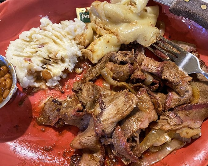 This isn't just brisket—it's a masterclass in smoke and patience, served alongside creamy sides that make you want to lick the plate.