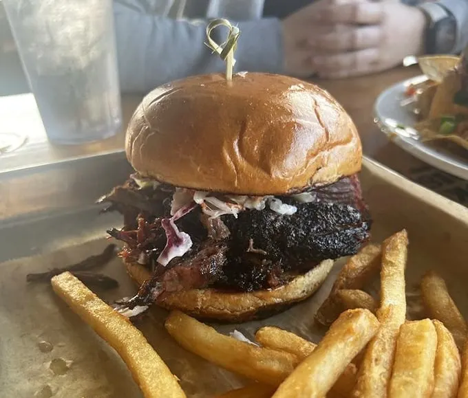 Not all heroes wear capes—some come on brioche buns. This brisket sandwich with its perfect bark might just bring a tear to your eye.
